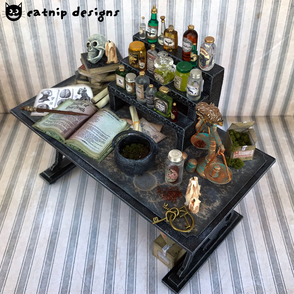 artistic catnip: a Wizard's potion making table...