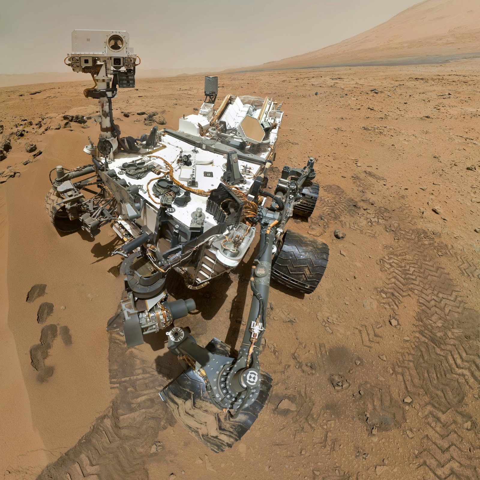 Orbiter.ch Space News: Rover Arm Delivers Rock Powder Sample