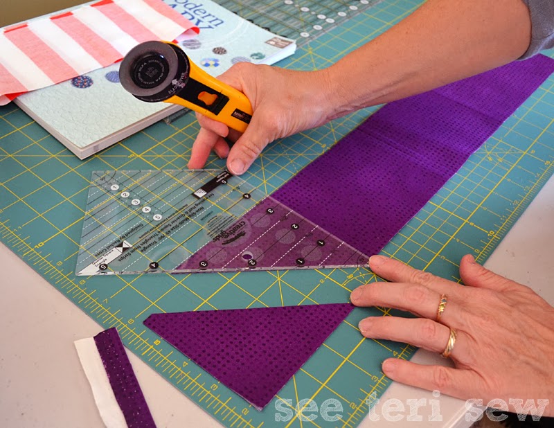 See Teri Sew: Half-Square Triangles: Ruler Method vs. Traditional Method