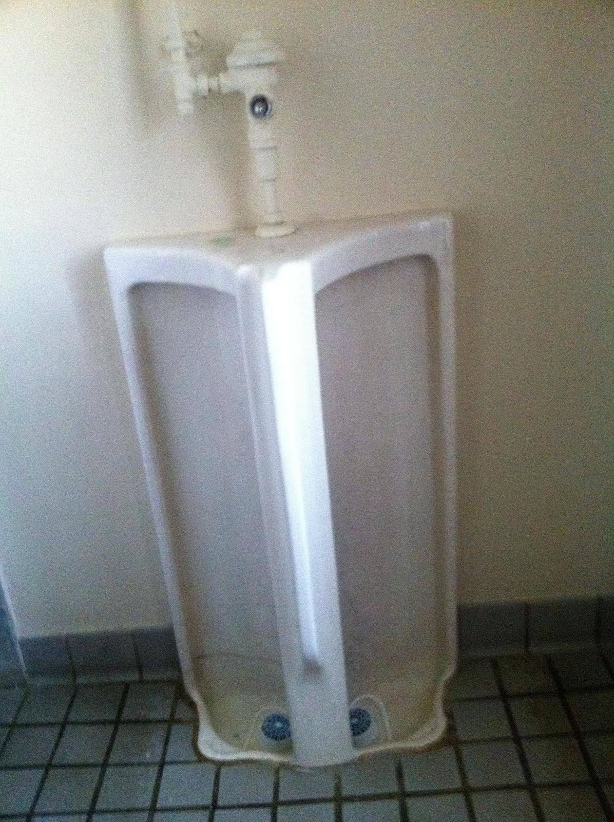 One of the most awkward urinal design ever? (x-post funny) : r/pics