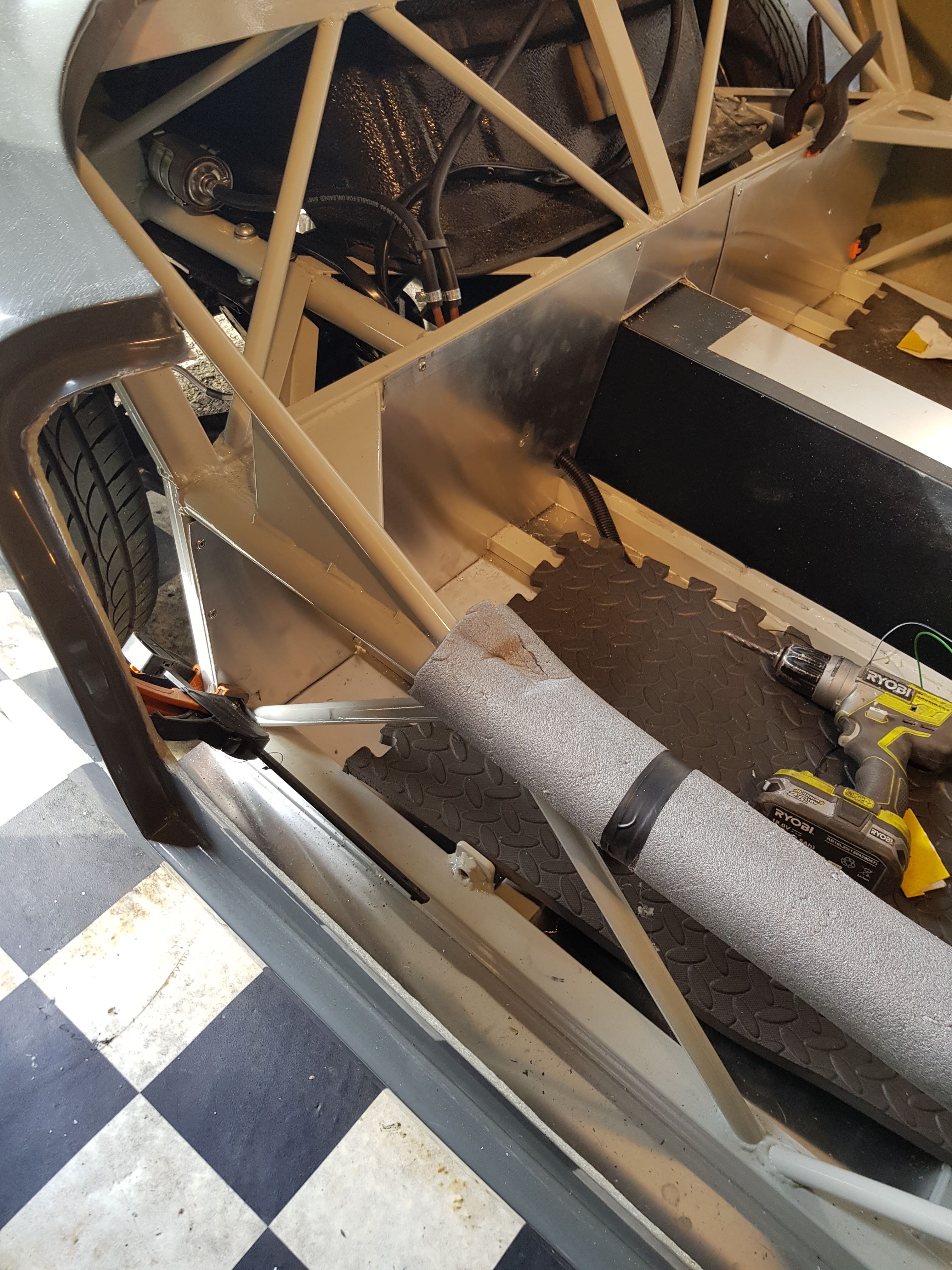 Lower rear bulkhead panels and handbrake fittings