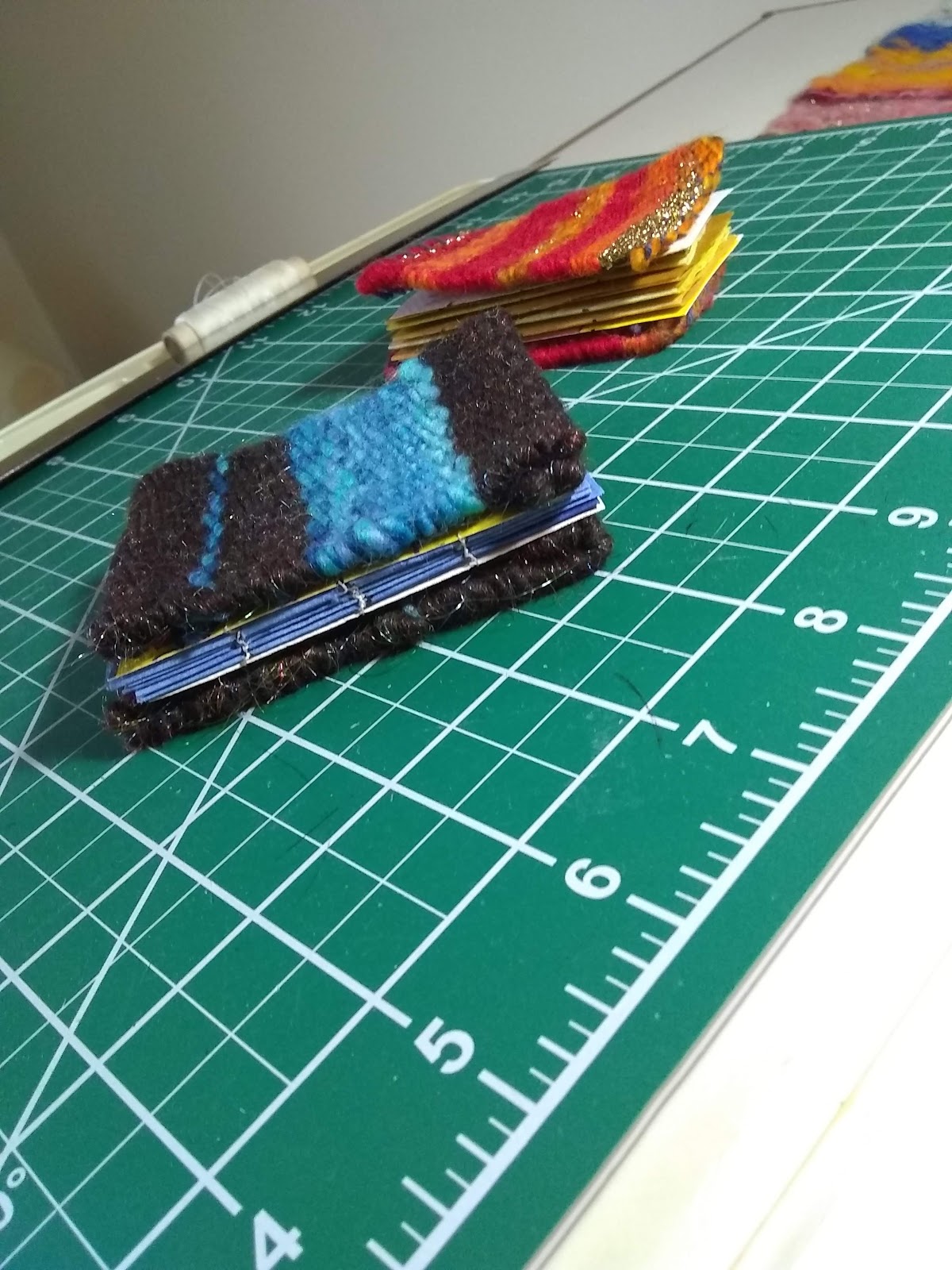 Art, the Beautiful Metaphor: Bookie at work, also paper spinner