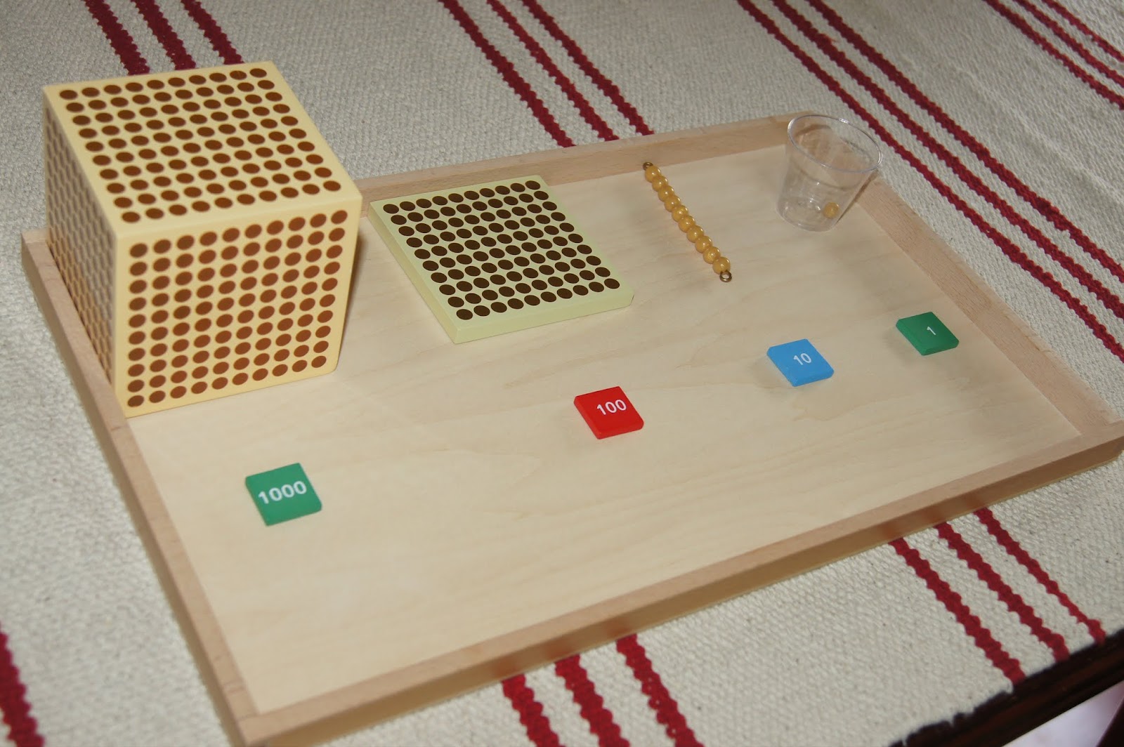 Montessori Stamp Game, Montessori Math At Home - "Making Montessori Ours"