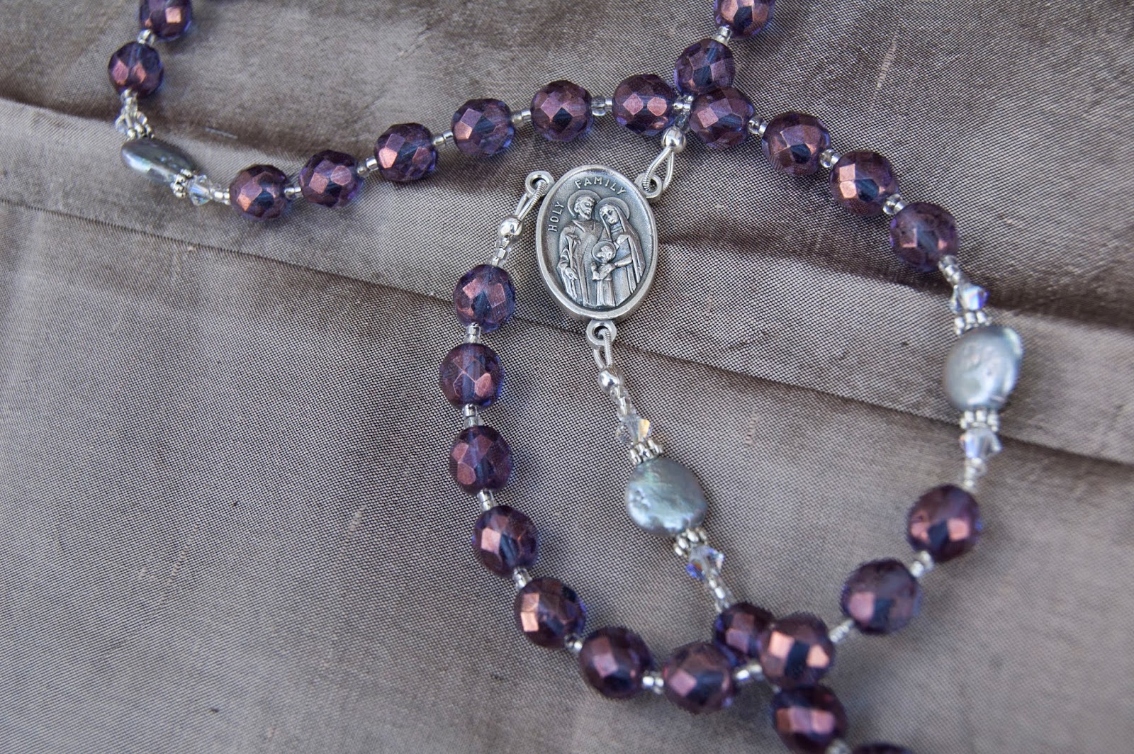 Crown of Roses Designs: Holy Spirit and Holy Family Purple Luster Rosary