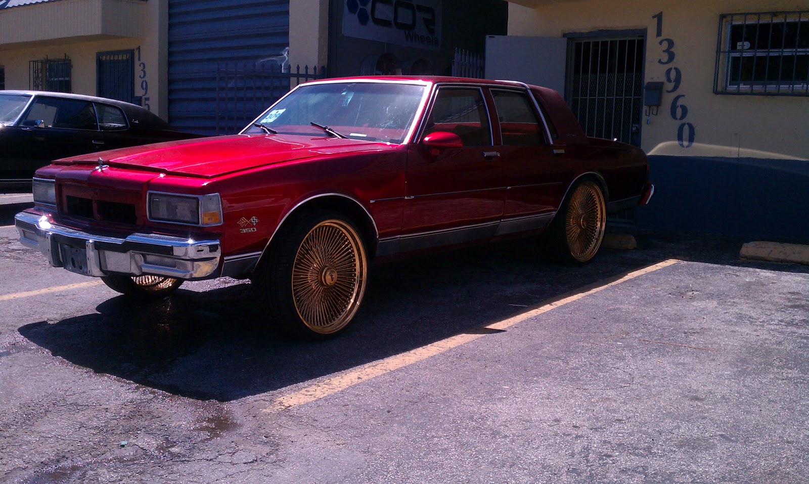 PHOTOGRAPHY BY MIAMIEARL: Box Chevy LS Brougham on 24" Gold Dayton's