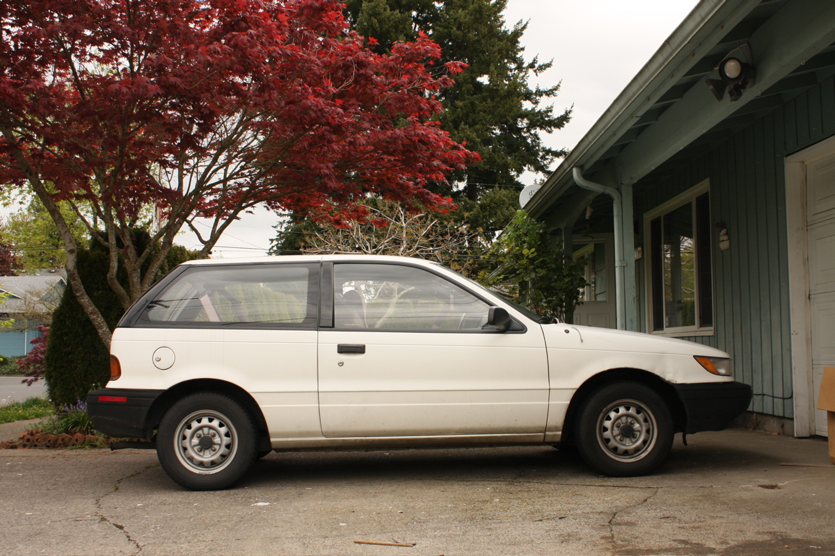OLD PARKED CARS.: Colt Cult: 1992 Plymouth Colt Hatchback...