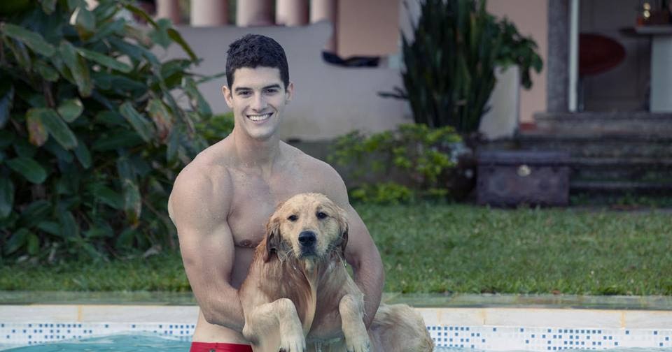 Hunksinswimsuits: Hunk. Pool. dog. Red Speedos. Muscles.