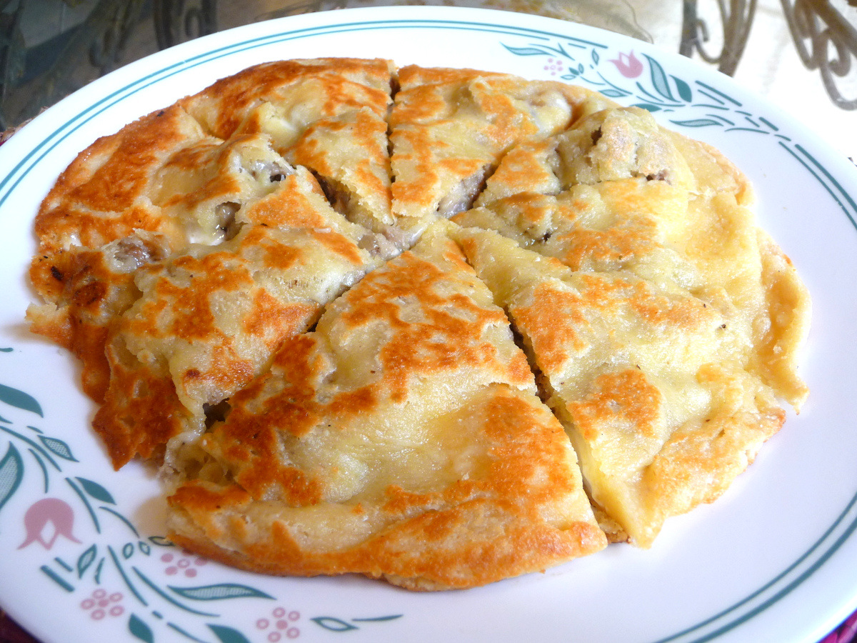 MOLTEN CHEESE BEEF OR CHICKEN QUESADILLAS