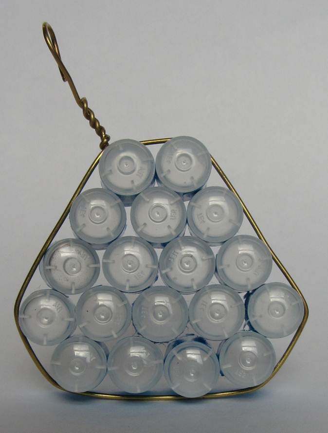 Mabel Lowman Art: Repeating pattern with found objects.