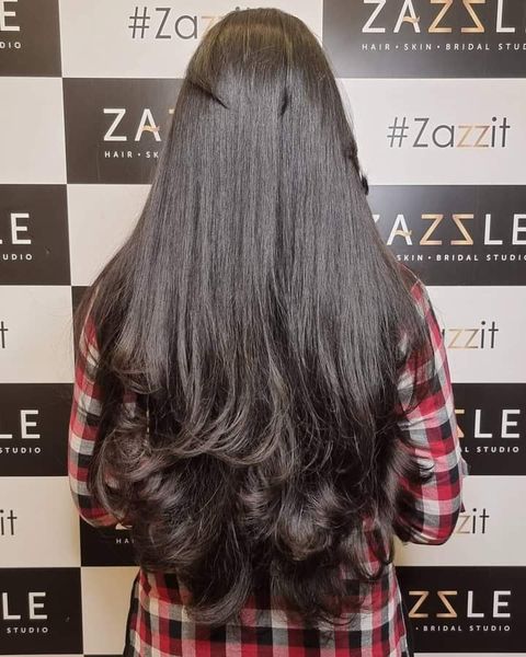 Low back length hair style - Village Barber Stories