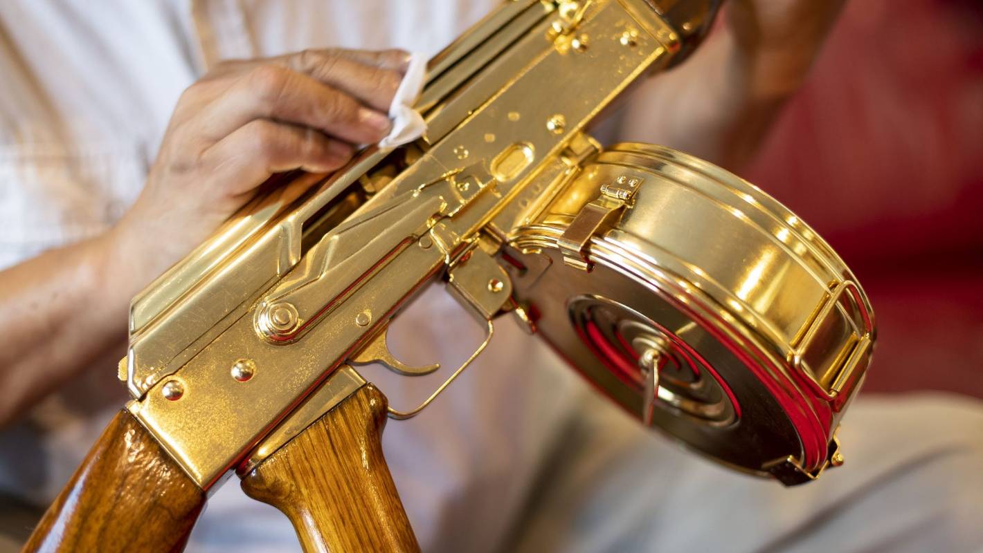 Gold weapon's Saddam Hussein's AK 47 Gold Platted - Gold Information Blog