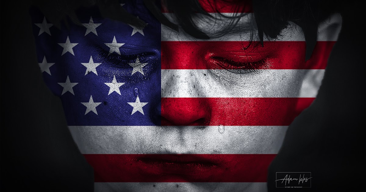 beautiful backgrounds of the American flag on the face sad child