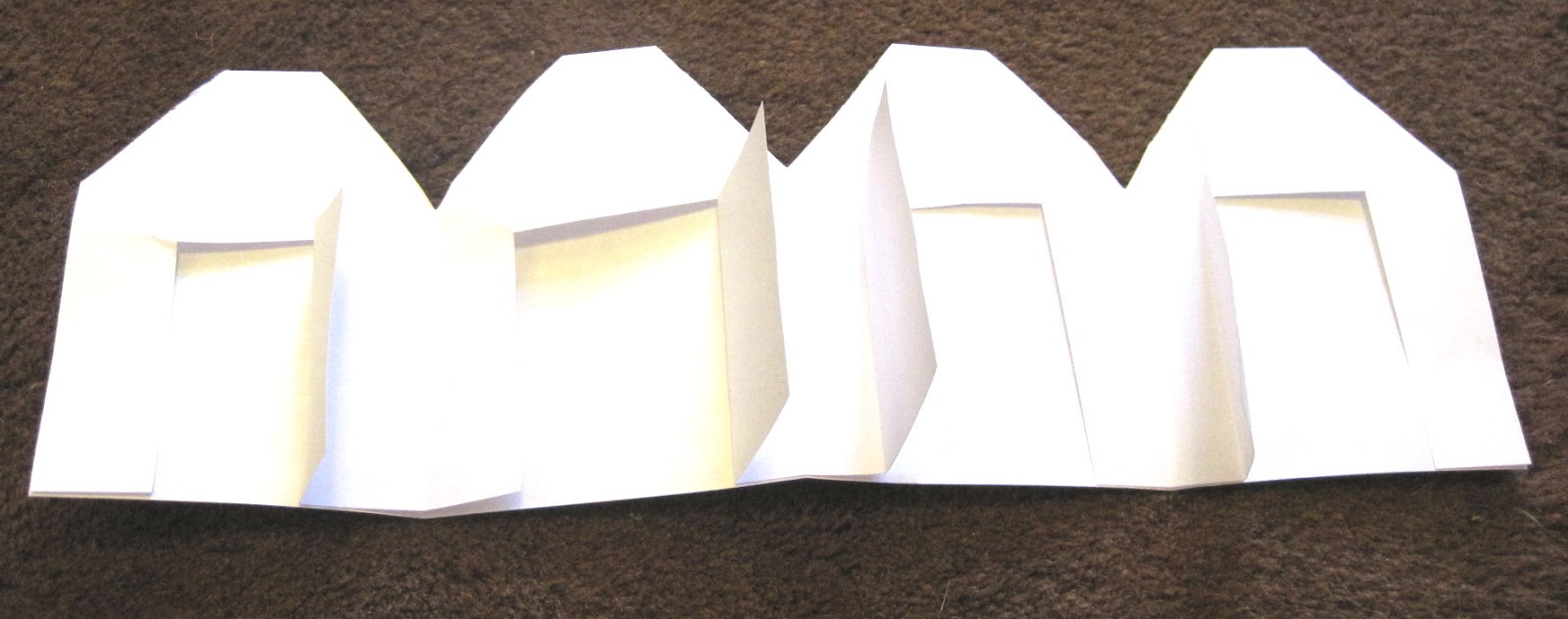 Changing Phase: Paper Buildings in Town