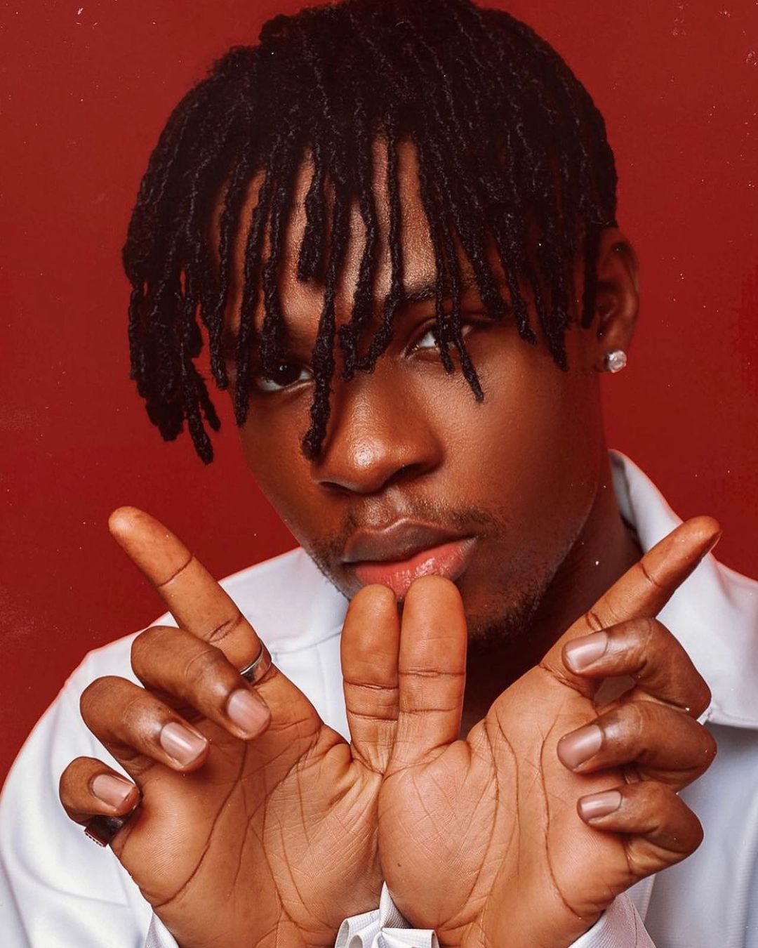 Photos of Joeboy Hairstyle