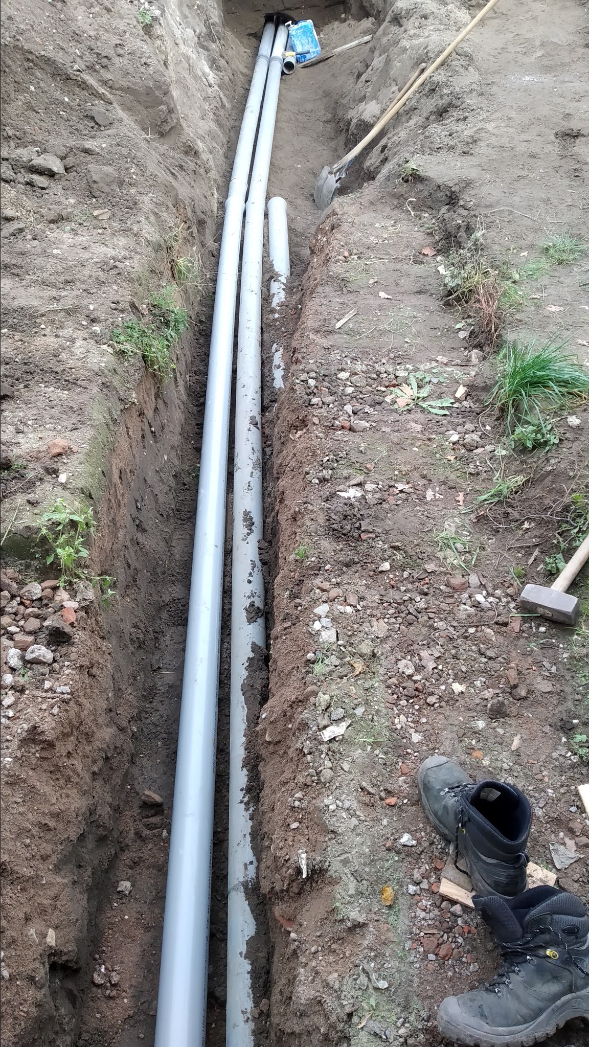 vdbeke.be: wachtbuizen tussen kelders, kelder aanvullen, inrit testen