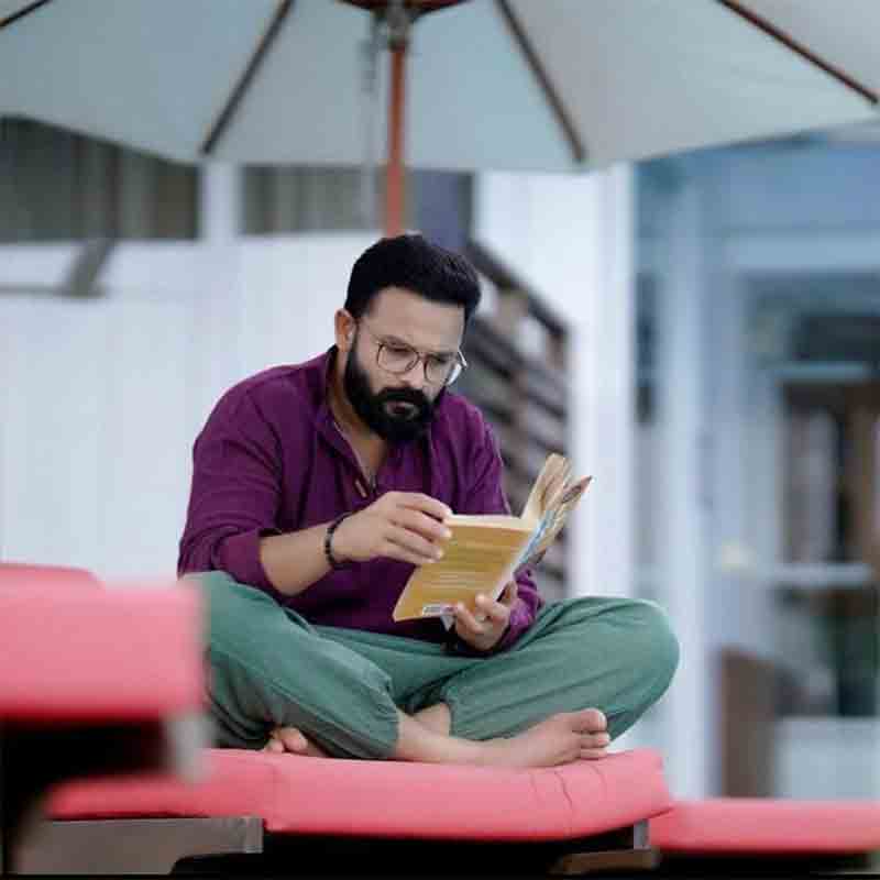 Jayasurya busy with books - Photos Plus Jayasurya busy with books - Photos Plus