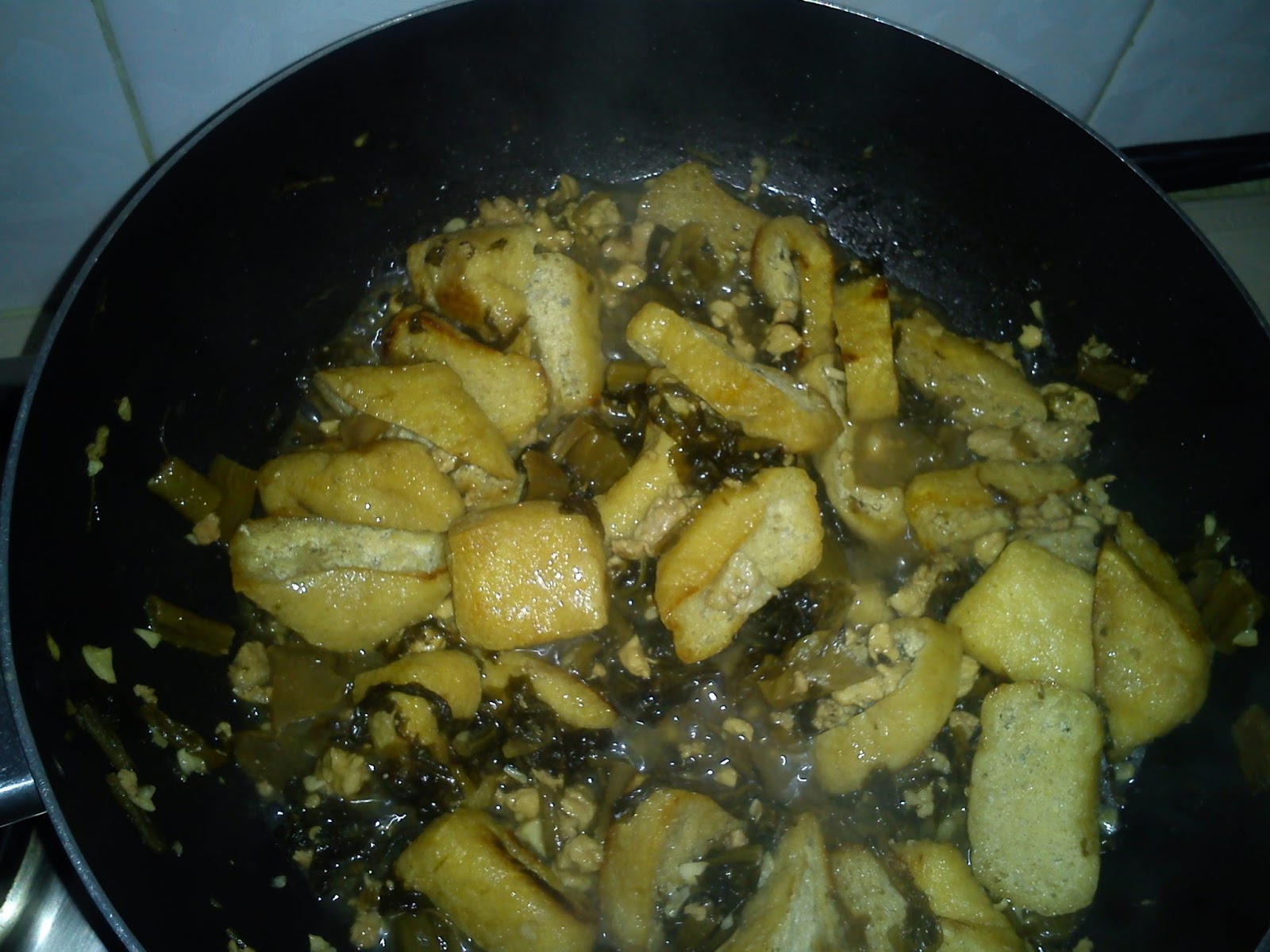 Cooking Pleasure: BRAISED TAUPOK WITH MEI CAI