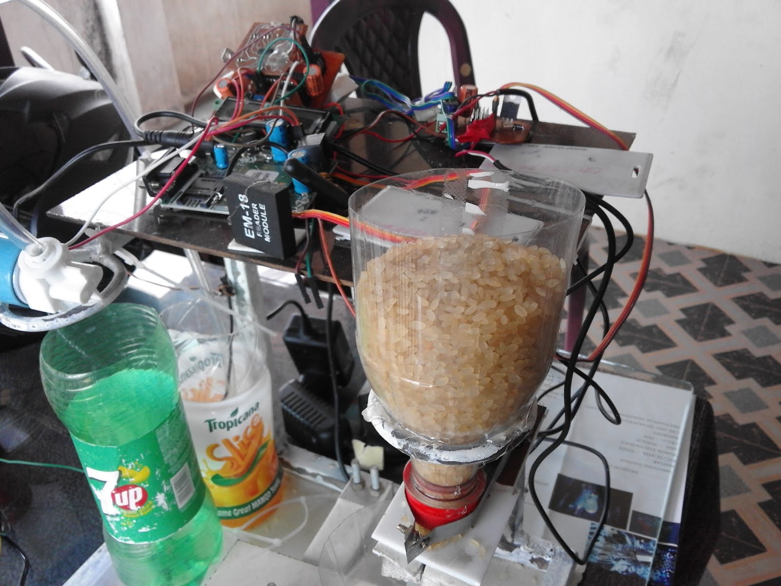 SMART RATION CARD SYSTEM USING LOAD CELL,PUMP,RFID,GSM - Emerging ...