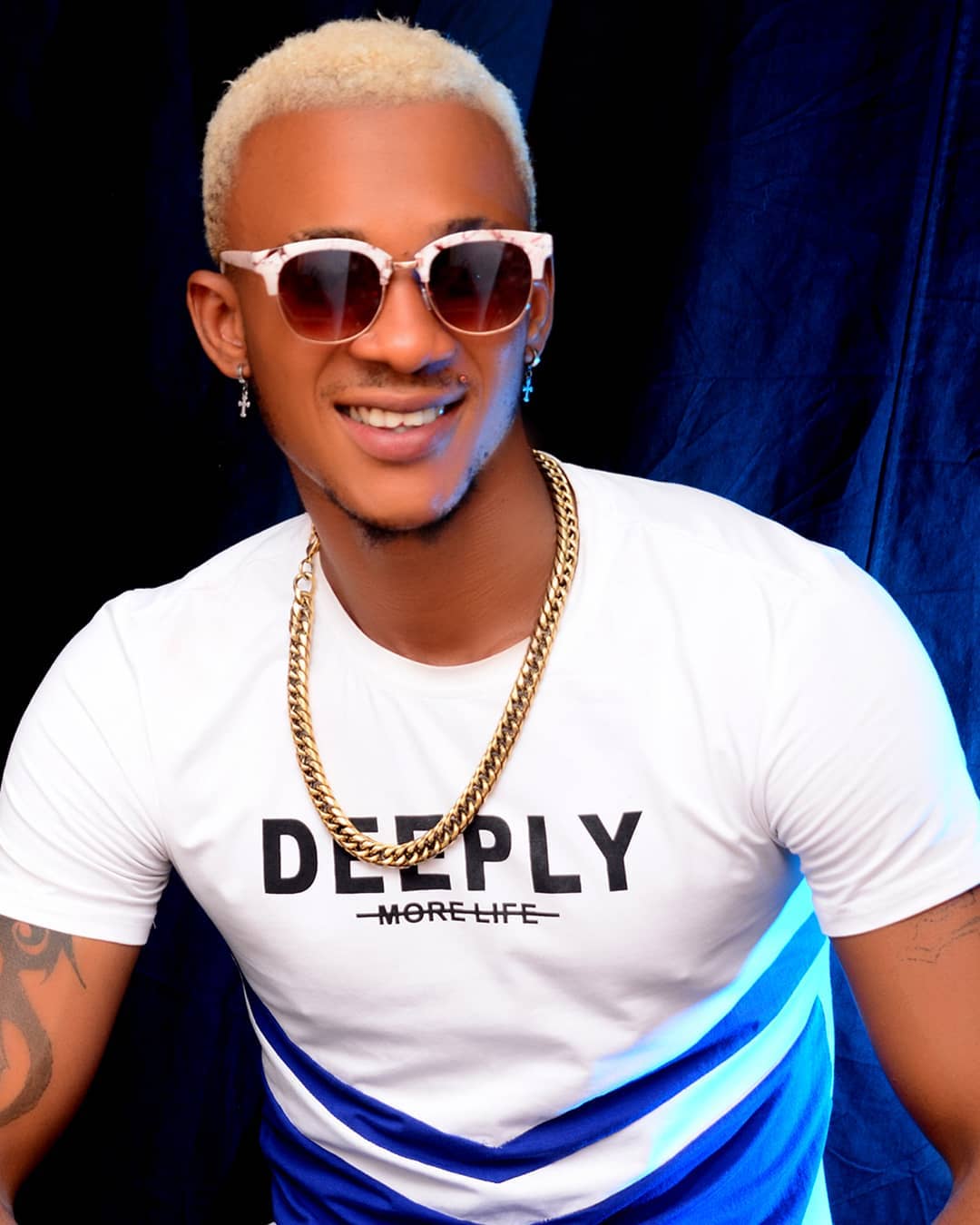 Some of TC Virus Okafor's photos are used as memes. Like the one with ...