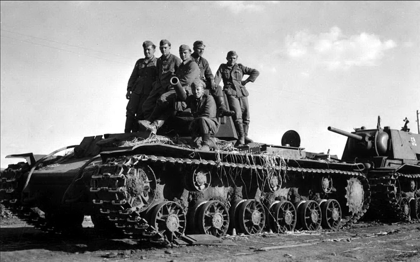 Men of Wehrmacht: Wehrmacht Soldiers Pose with Abandoned Soviet Tank