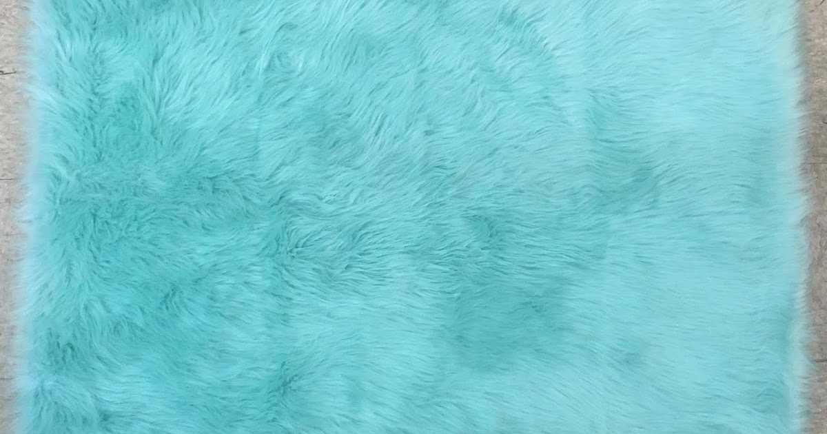Uhuru Furniture & Collectibles: Cyan Faux Fur Area Rug 31" x 46" - $45 SOLD