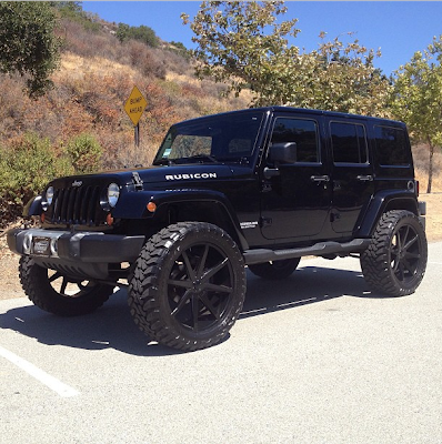 murdered out cars: Murdered Out Jeep Wrangler On Wagon Wheels