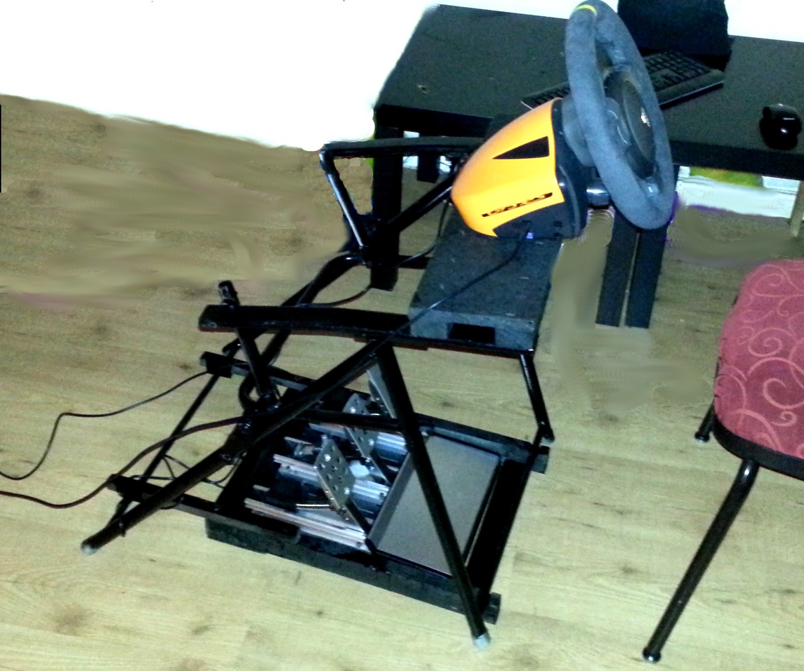 Creating a steering wheel stand from an old garden chair