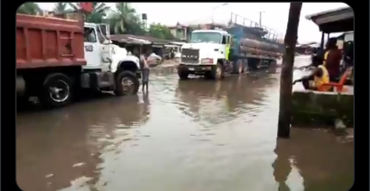 Two Heavy Trucks Sank On The Road One After The Other In Orogun, Delta ...