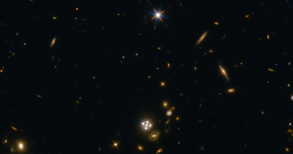 esplaobs: FOUR QUASAR IMAGES SURROUND A GALAXY LENS Image Credit: ESA ...