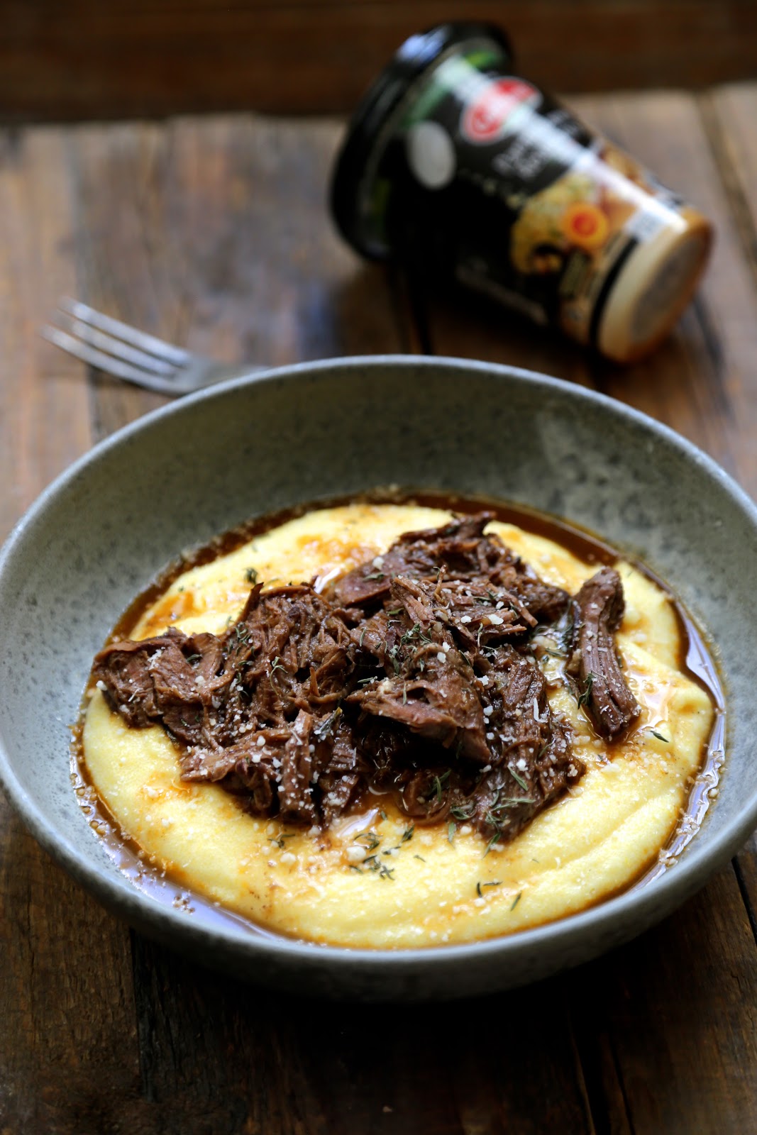Polenta crémeuse , ragout de boeuf , fromage râpé Parmigiano Regiano ...