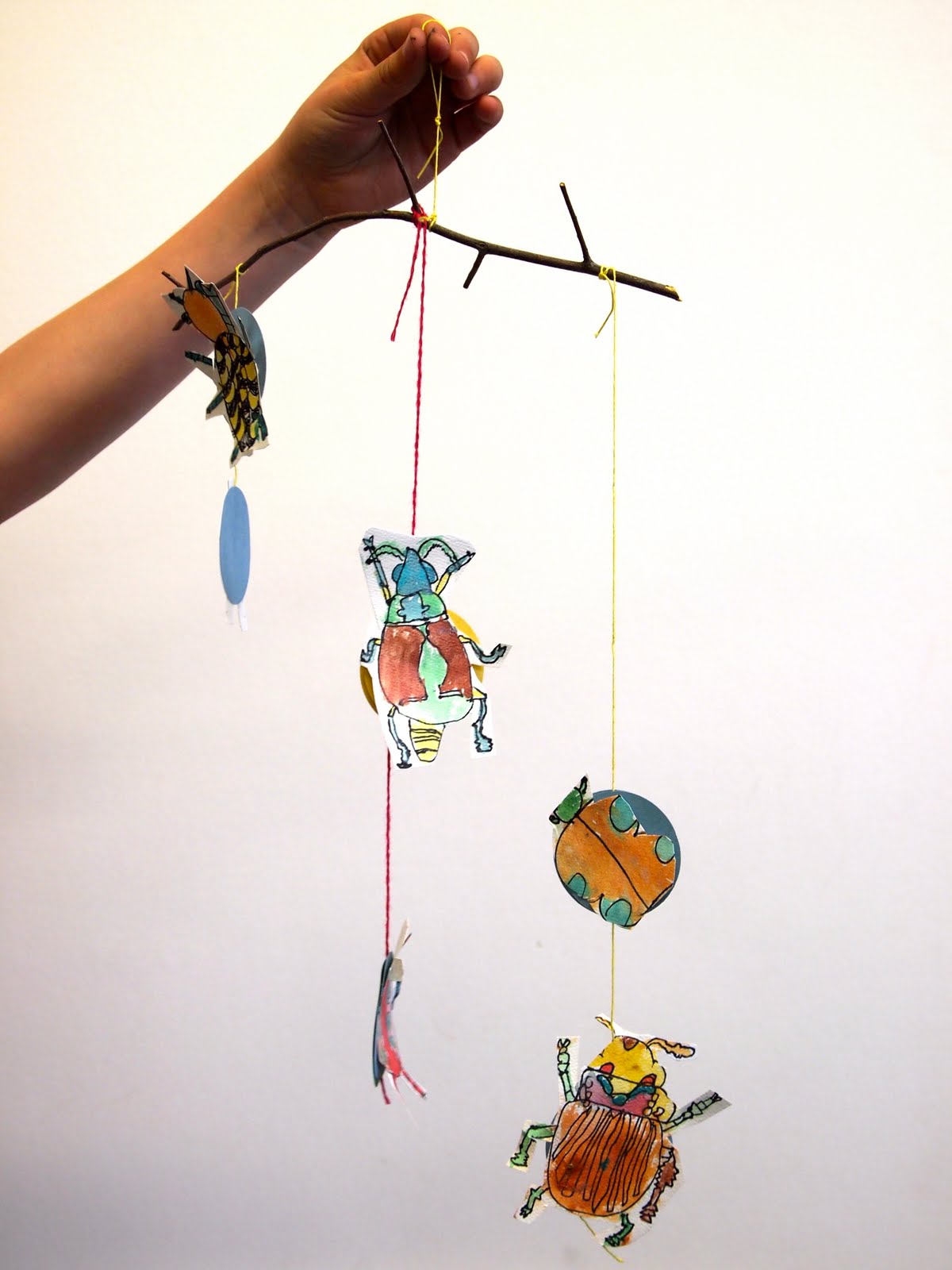 new city arts: first grade insect mobiles