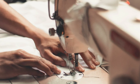 What is mending in garment repairing process?