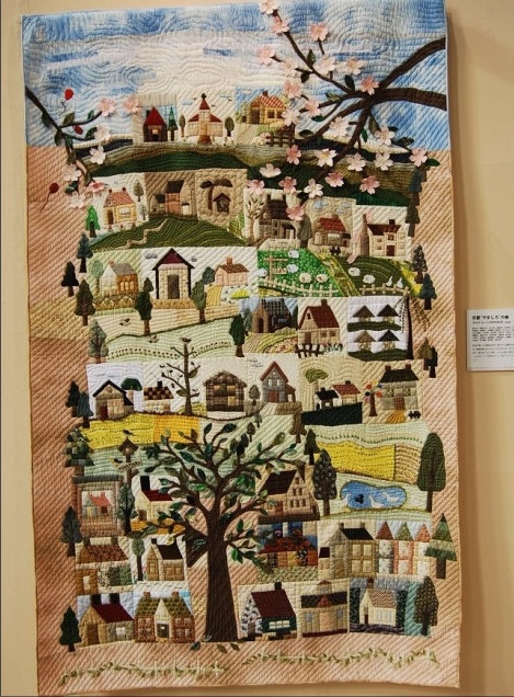 Panel patchwork wall with house