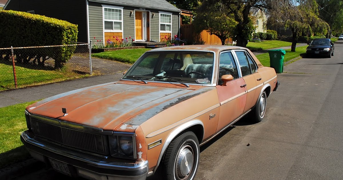 OLD PARKED CARS.: 1977 Chevrolet Concours.