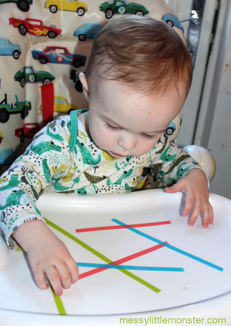 Peeling Tape Fine Motor Baby Activity Messy Little Monster peeling-tape-fine-motor-baby-activity-messy-little-monster