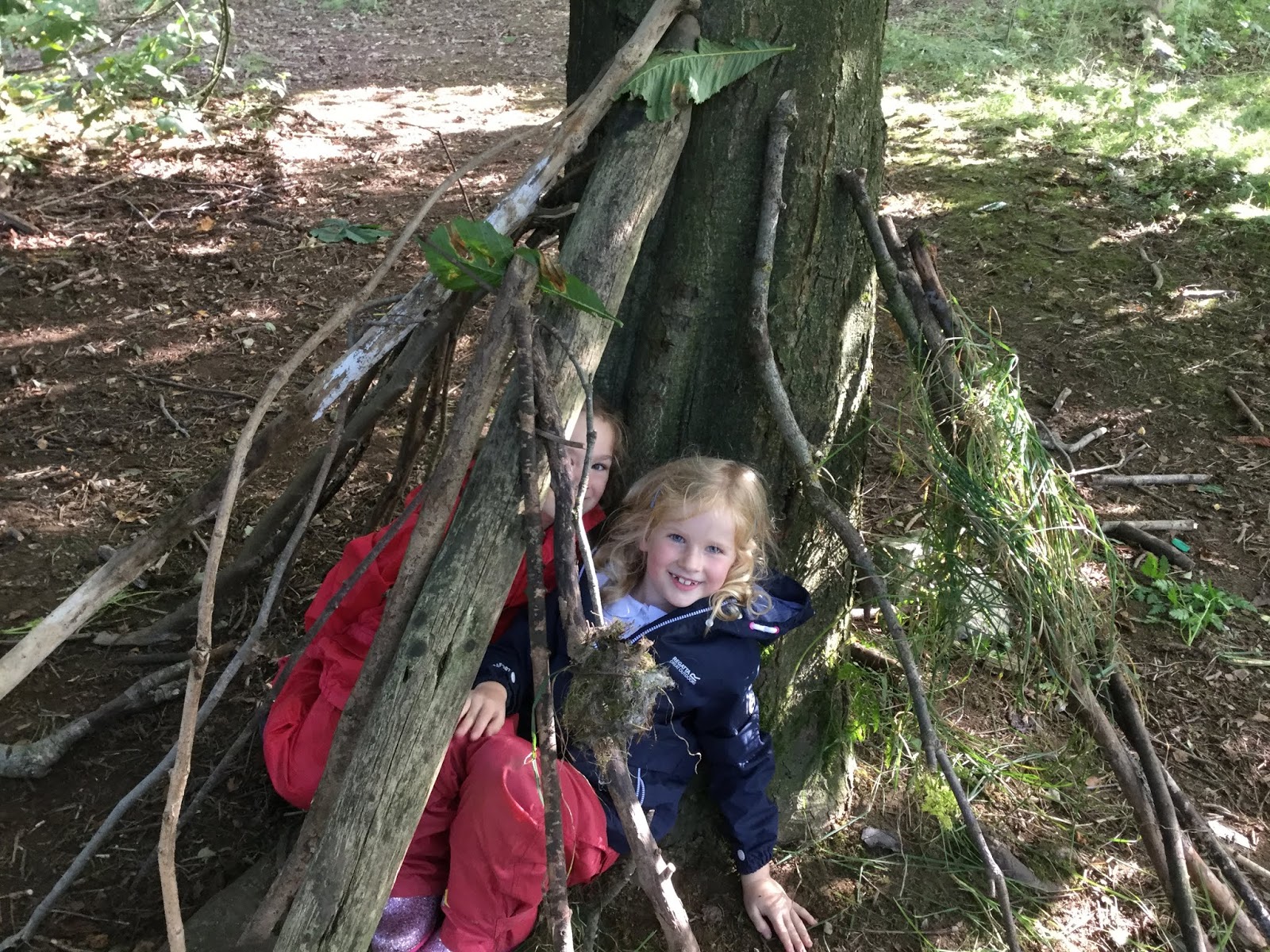 Making dens in forest school
