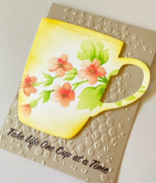 three umbrellas: One Cup at a Time