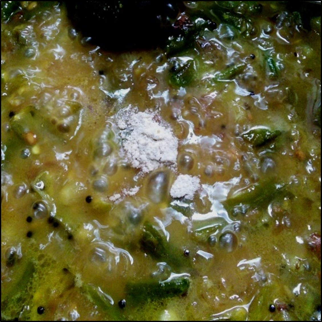 Puli Milagai (Green chilly in tamarind sauce)