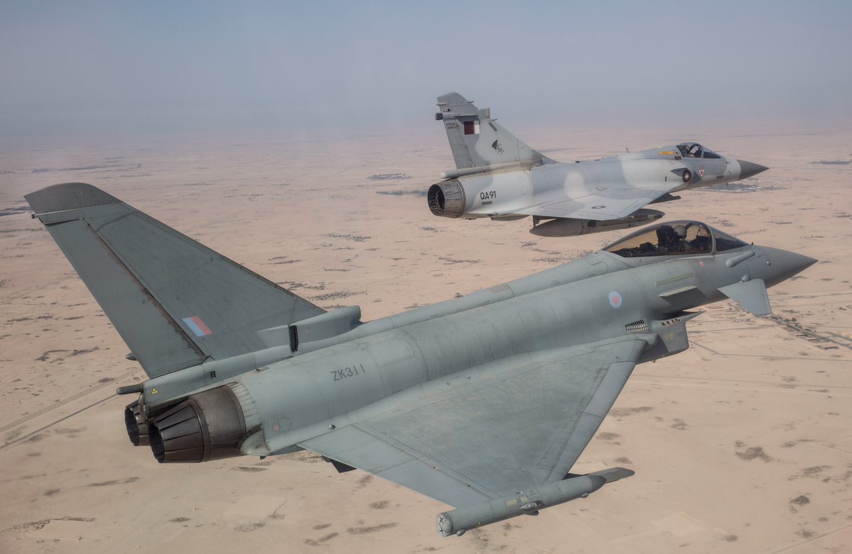 Asian Defence News: RAF Typhoon aircraft along-side a Qatar AF Mirage jet
