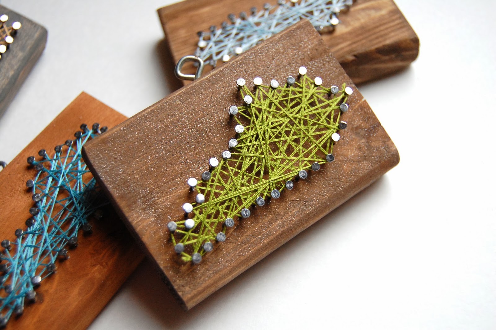 Done is Better than Perfect: Rustic nail and string art state ornaments