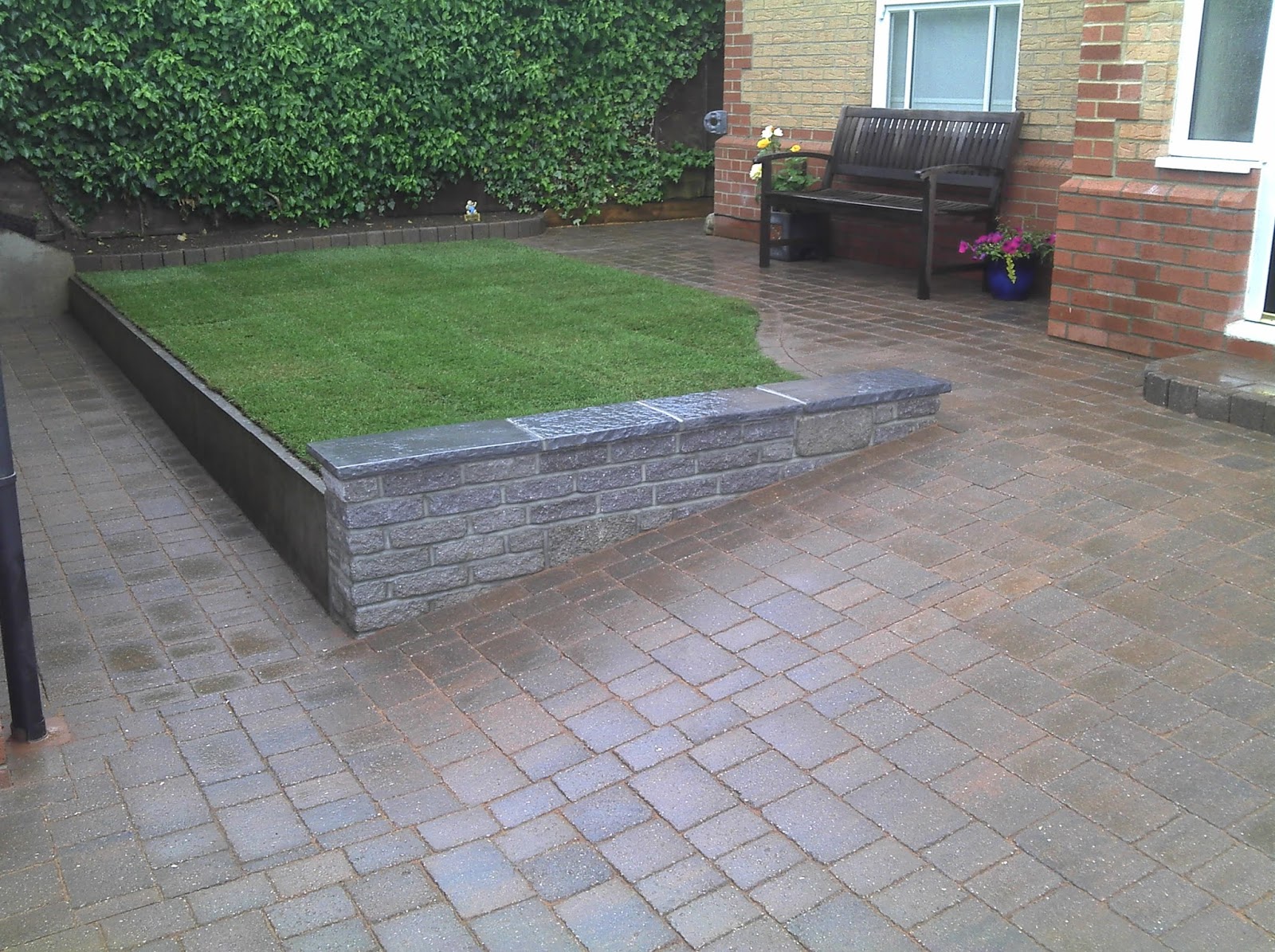 Garden first: Marshalls Tegula blocks and Marshalls walling. Rolawn turf.