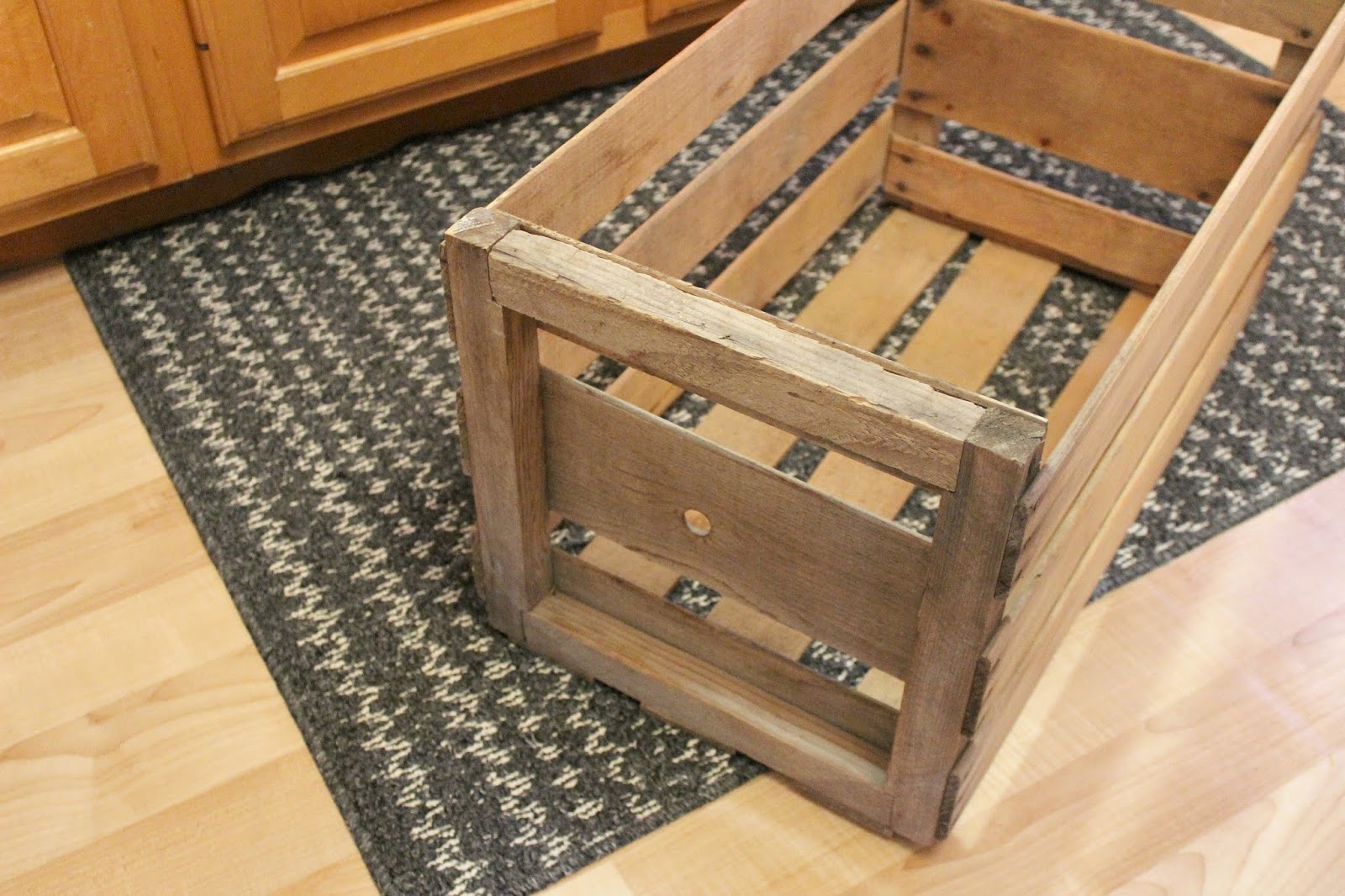 Stenciled Rustic Christmas Crate With Spruce Tips/Tops - Organized Clutter