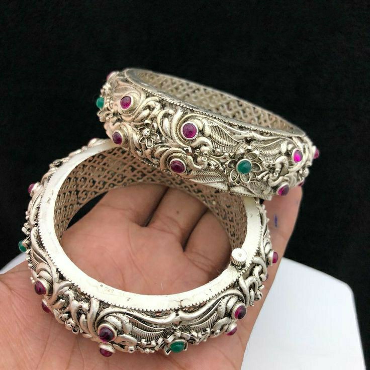 Broad silver bangles