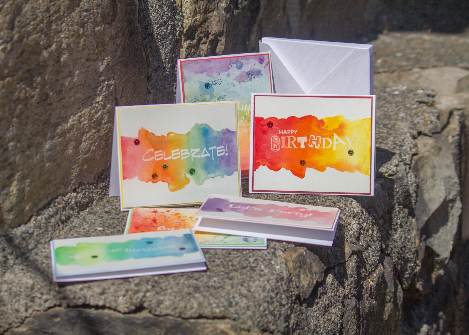 I used a cheap $9 set of watercolors from Michael's and created rainbow ...