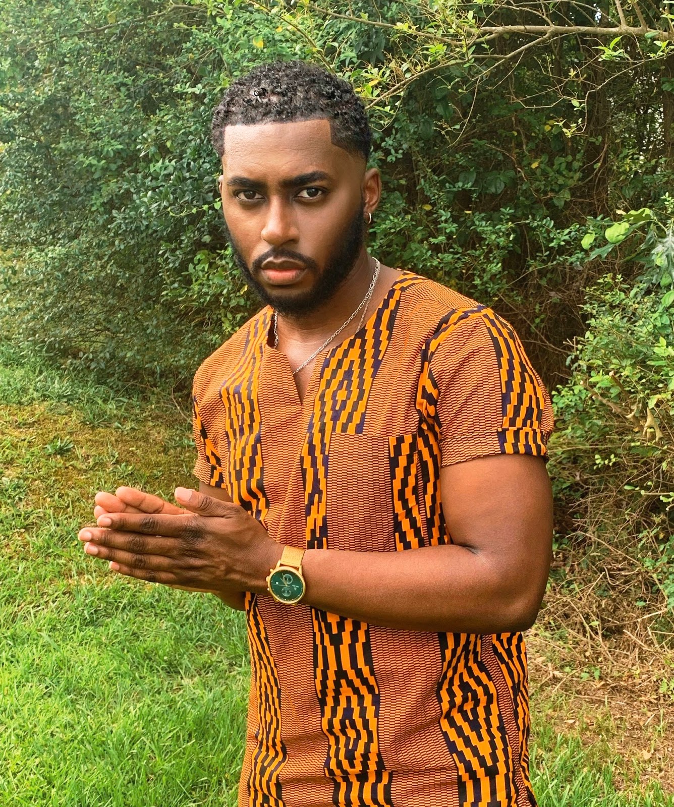 Photos of Osaze Akil wearing African Outfit