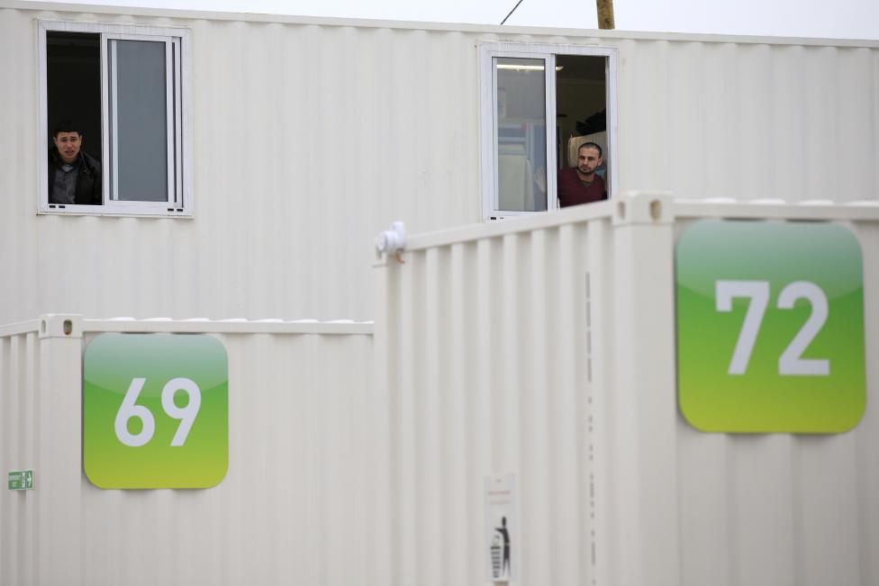 Migrant Crisis : A migrant shelter made from containers - World Politics