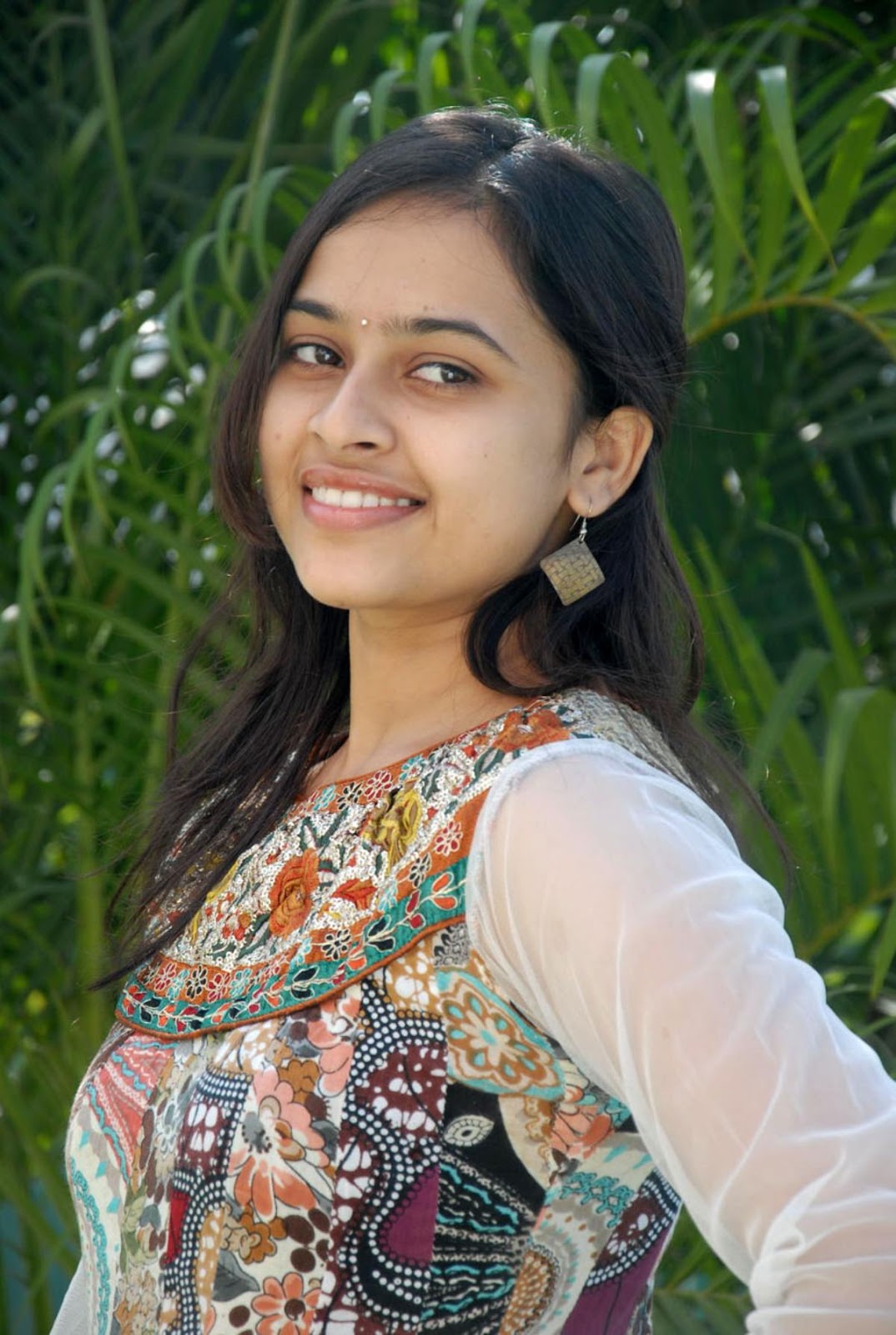 Actress Sri Divya Photos At Bus Stop Success Meet.