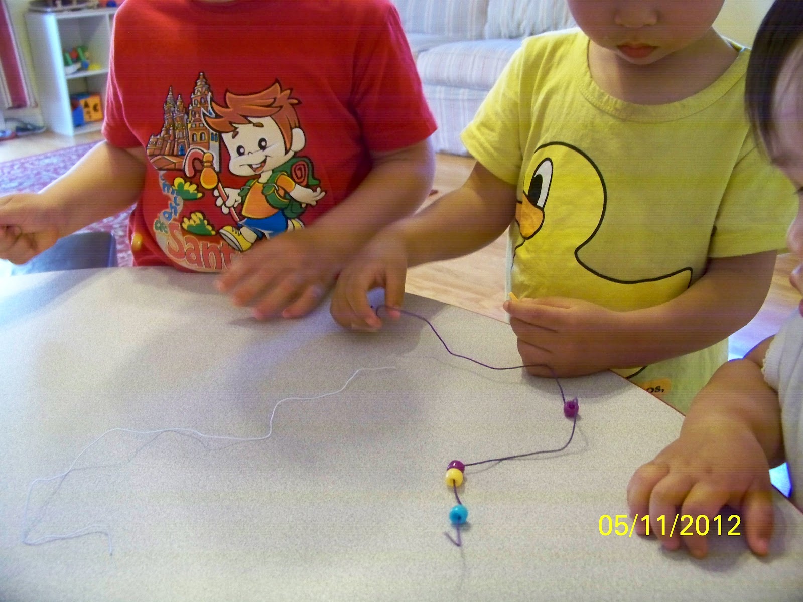 LemonTree Family Child Care: Fine Motor Skills: Stringing
