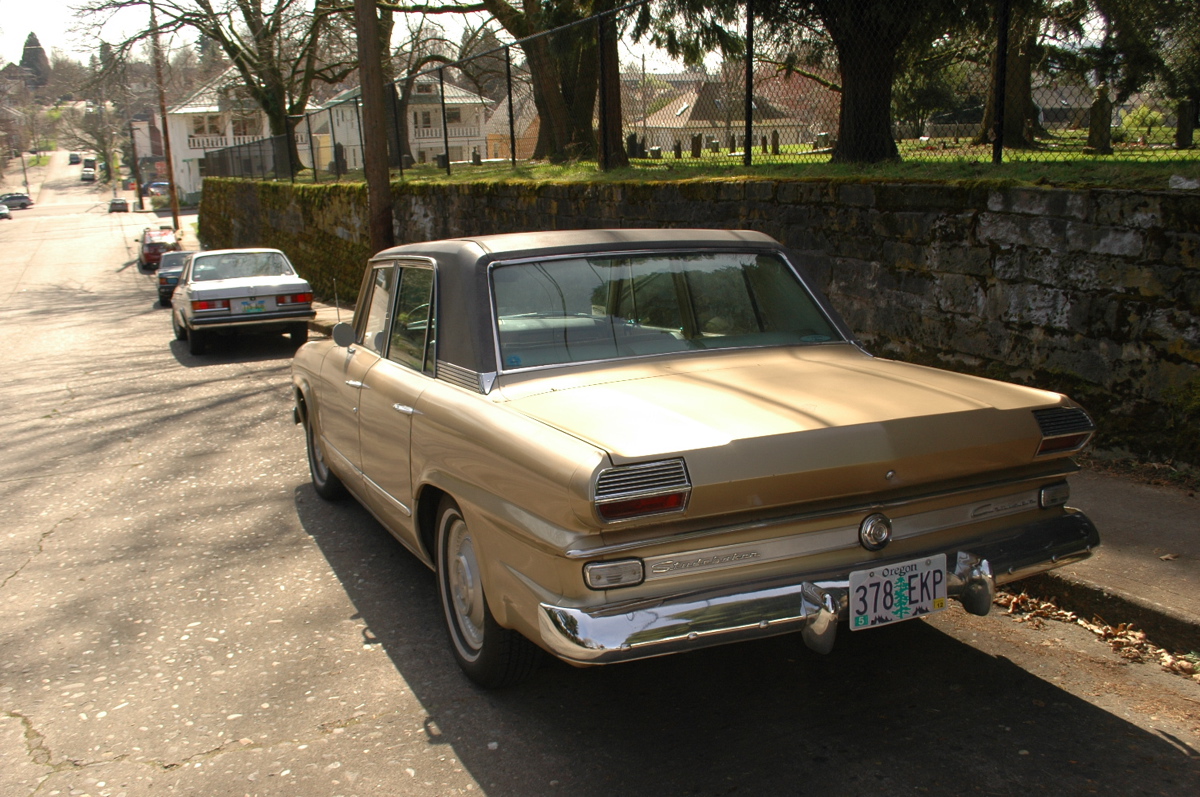 OLD PARKED CARS.: 1966 Studebaker Cruiser.