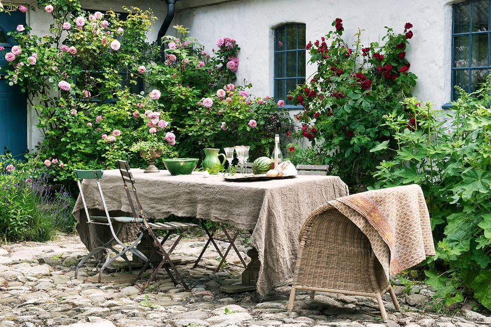 Rural decor and French influences at an artist's home in Österlen, Sweden